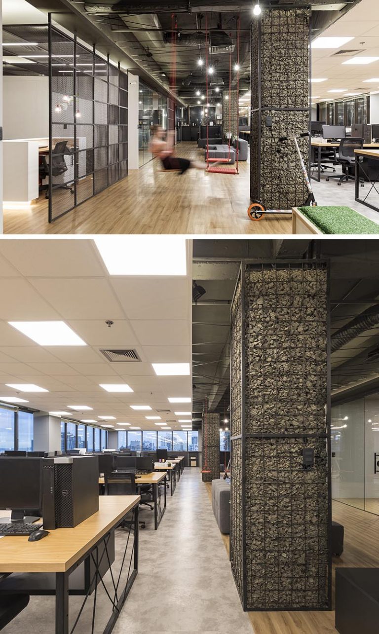 Gabions Hide The Plain Concrete Columns In This Office