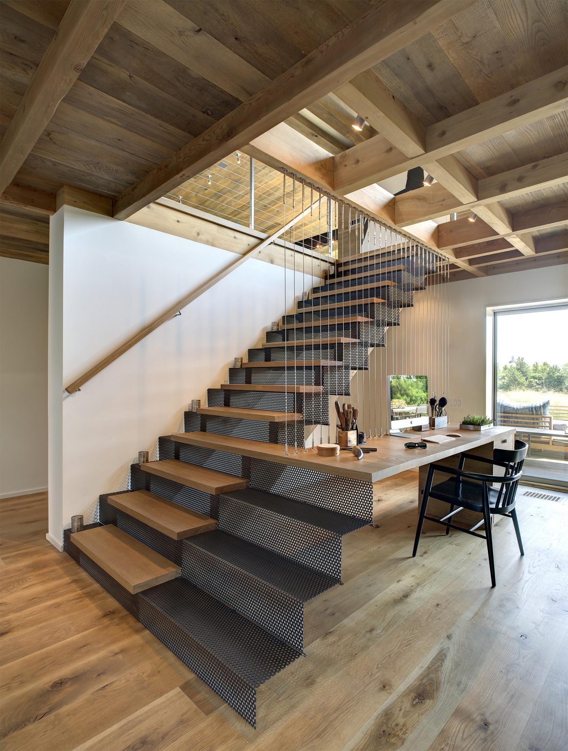 A Desk Was Combined With These Stairs To Create A Small Home Office