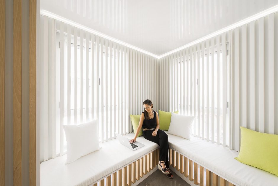 Wood Slats On The Walls Give This Home's Interior A Distinct Look