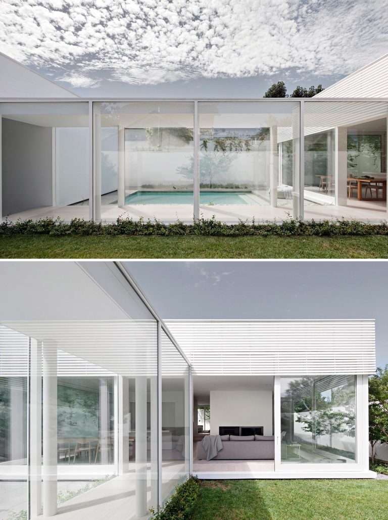 The Minimalist White Exterior Of This Modern House Opens To A Matching ...