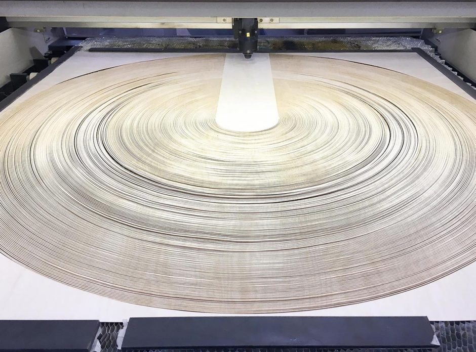 An LED And Laser-Cut Wood Combine To Create This Sculptural Pendant Light