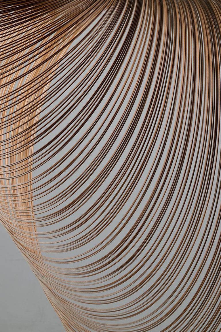 An LED And Laser-Cut Wood Combine To Create This Sculptural Pendant Light
