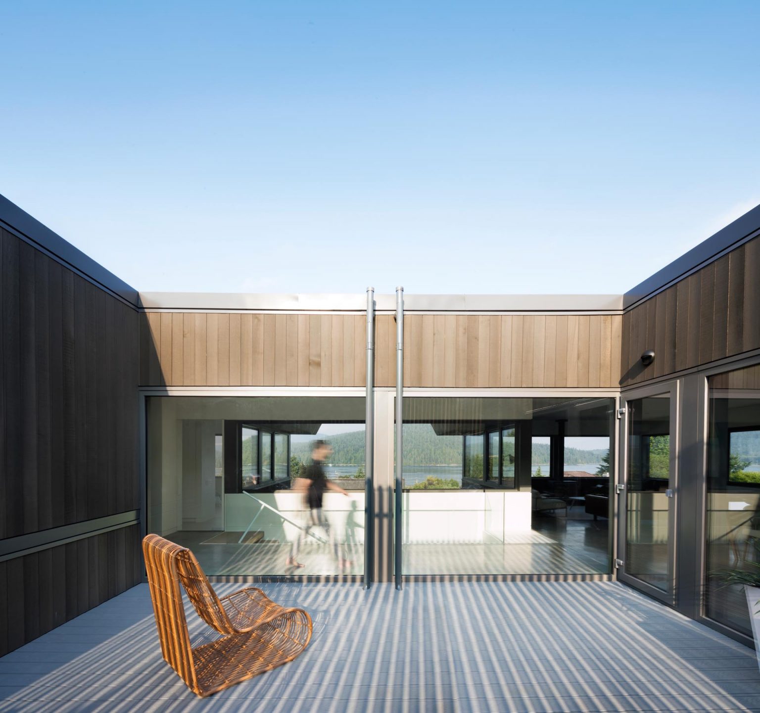 Wrap Around Windows Are Used To Capture The Water Views From This ...