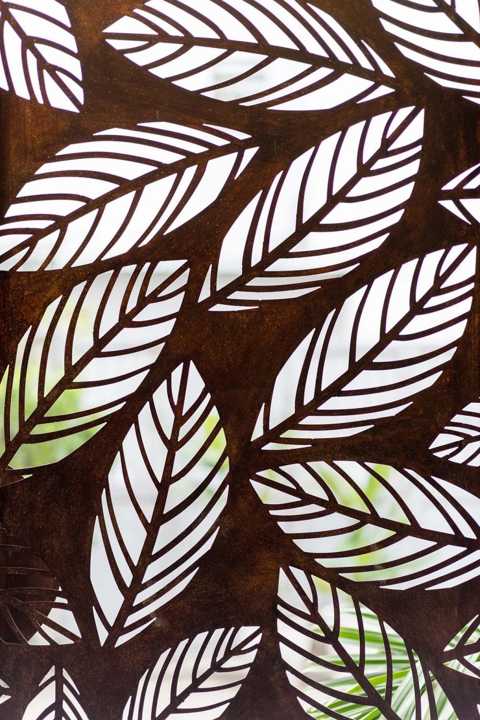 Metal Screens With A Leaf Motif Adorn Both The Interior And Exterior Of ...