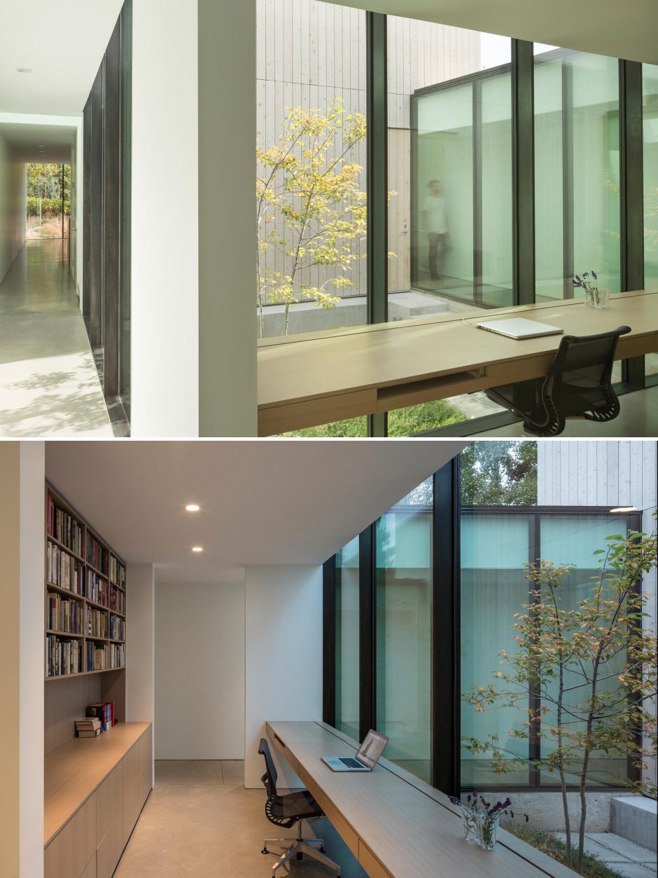 A Home Office Was Made Possible By Building A Desk Along A Wall Of ...