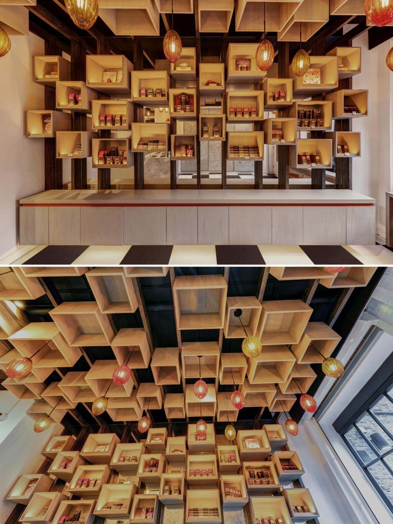 Wood Boxes Are Used To Showcase The Products Inside This Chocolate Shop ...