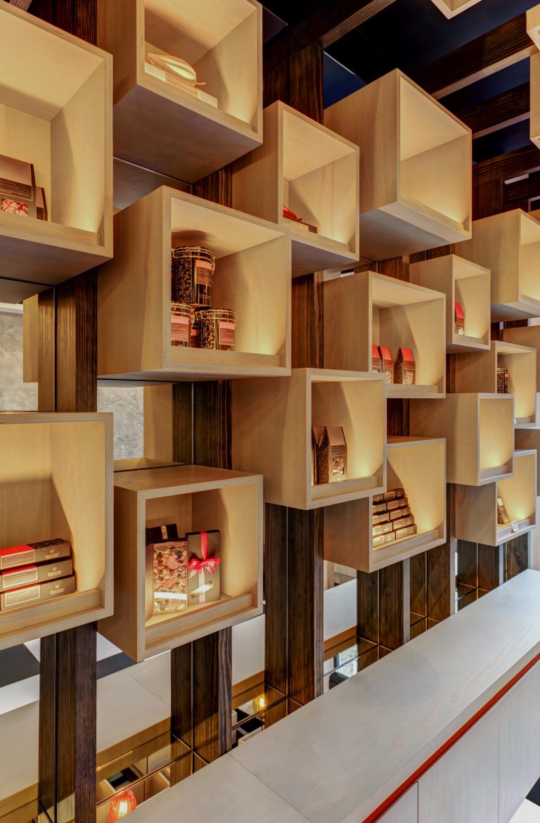 Wood Boxes Are Used To Showcase The Products Inside This Chocolate Shop ...