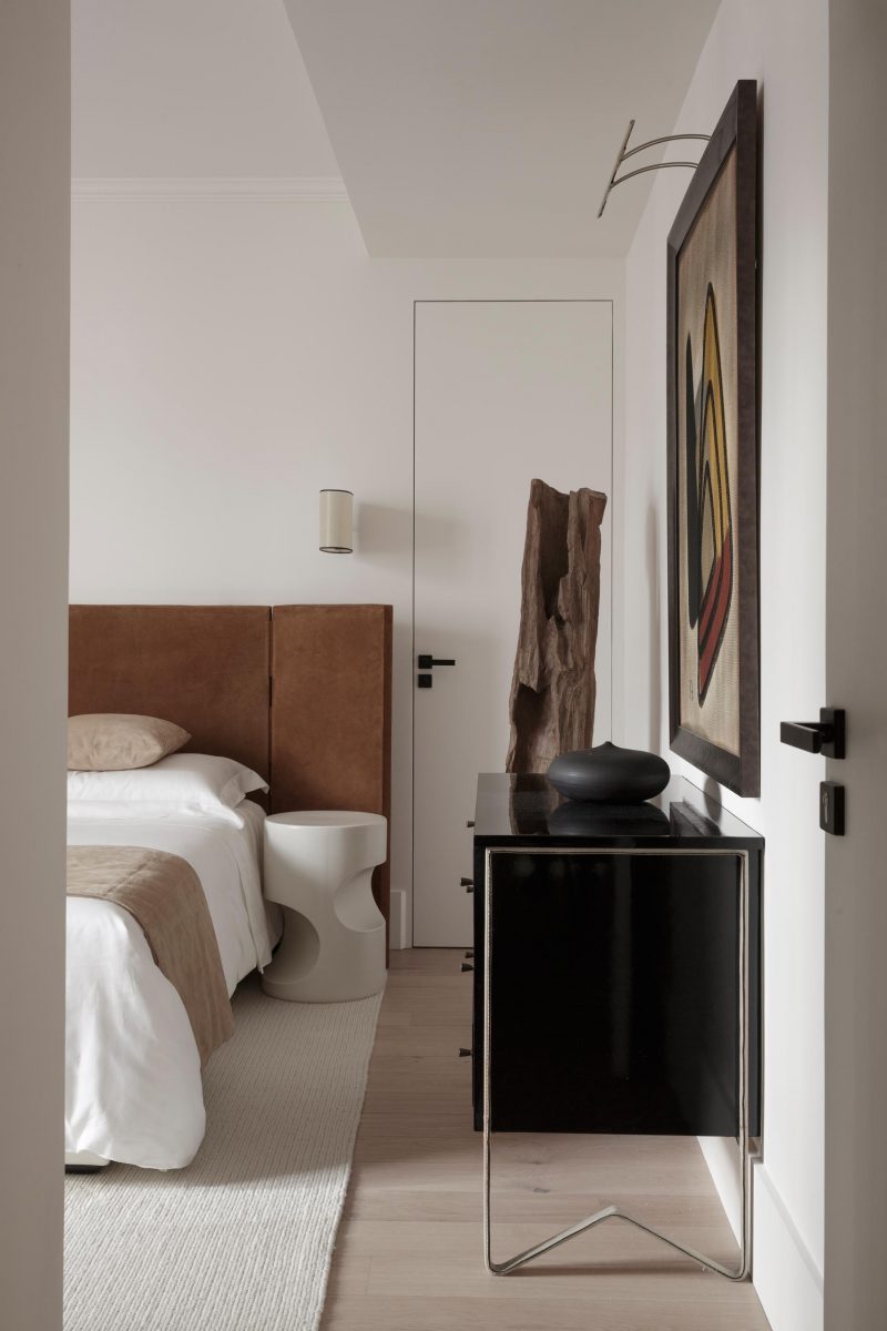 A Matte Black Kitchen Contrasts The Lighter Interior Furnishings Inside ...