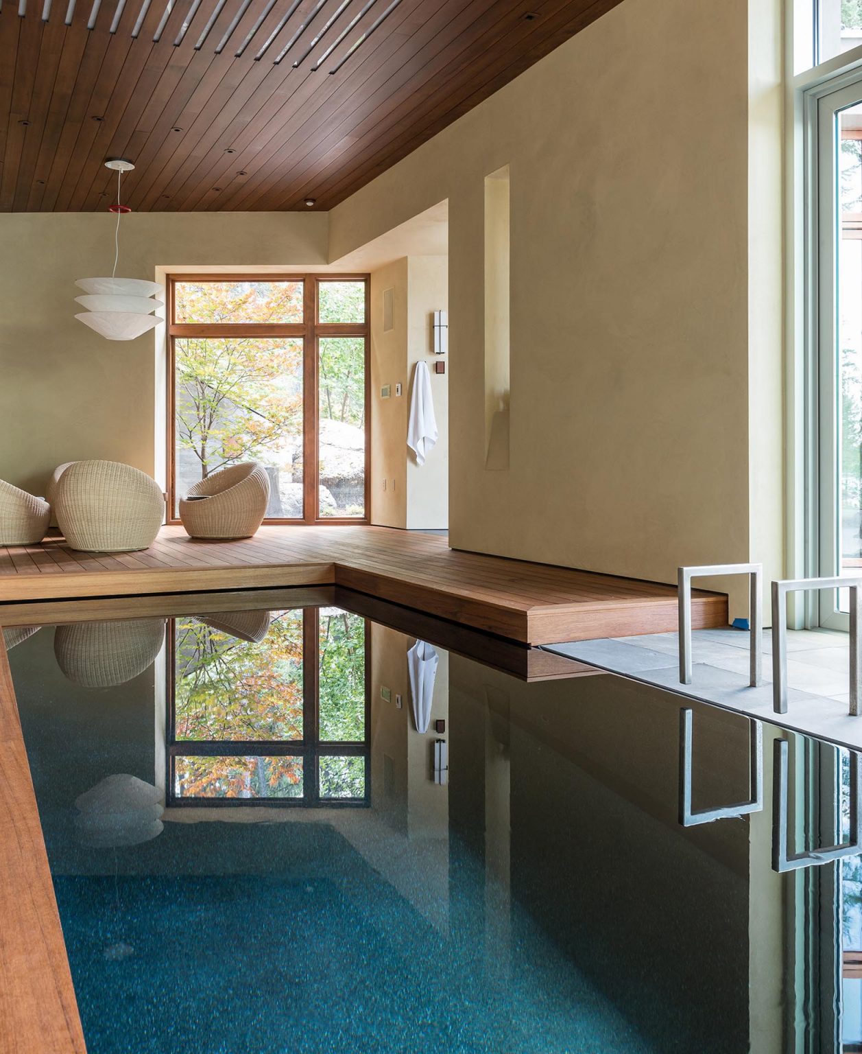 This Pool House Includes A Green Roof Covering The Lap Pool Below