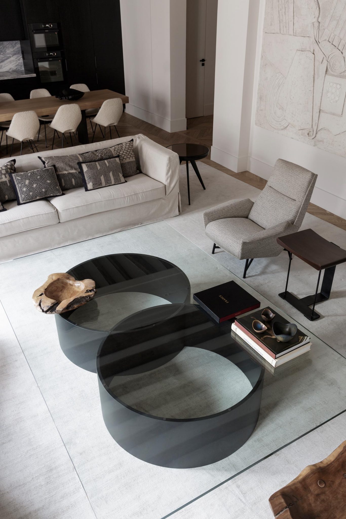 A Matte Black Kitchen Contrasts The Lighter Interior Furnishings Inside ...