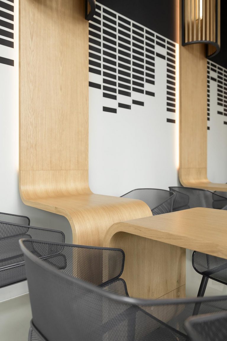 The Custom Designed Tables In This Cafe Are Like A Ribbon That Wraps ...