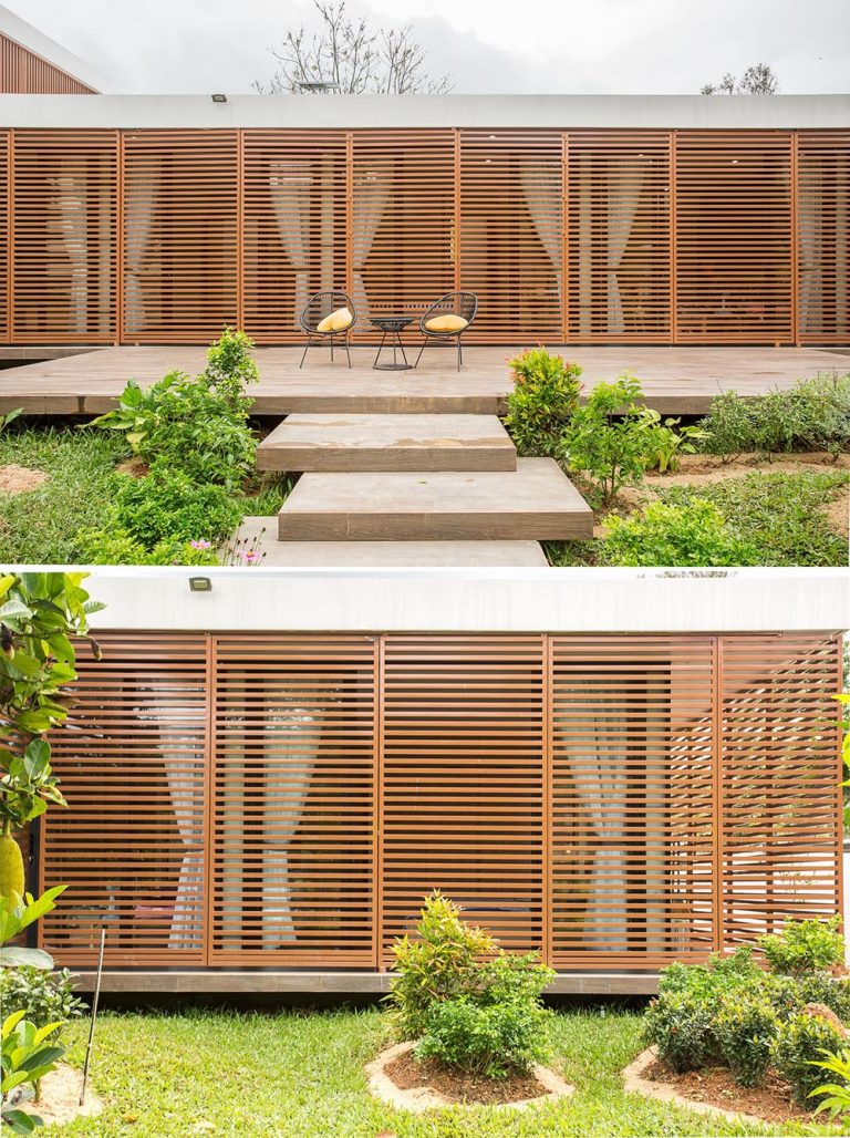 Operable Metal Screens Wrap Around The Exterior Of This Home