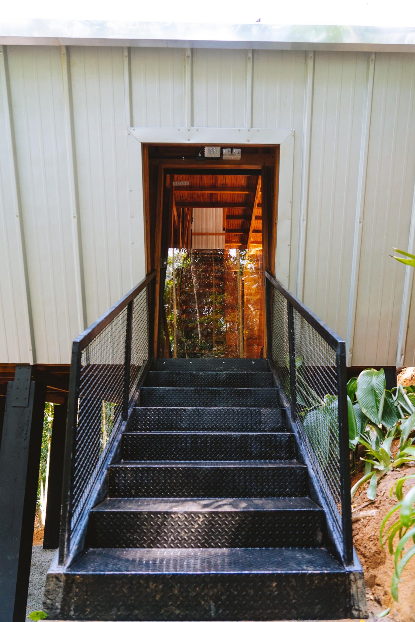 A Warm Wood Interior Welcomes Guests To This A-Frame Cabin