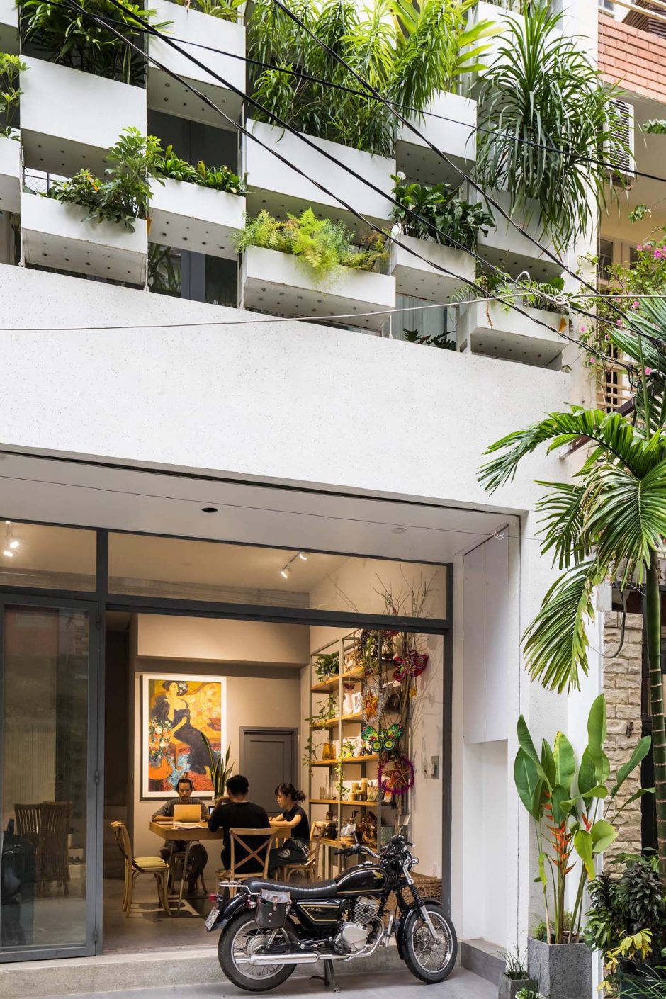 Built-In Planters Add Privacy And Greenery To This Home's Exterior