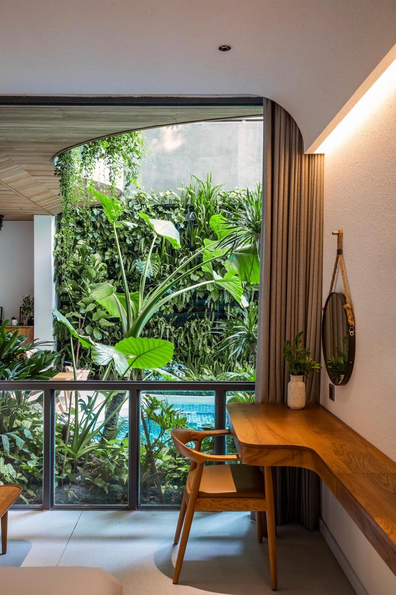 Wavy Balconies With Overhanging Plants Are A Design Feature On This ...