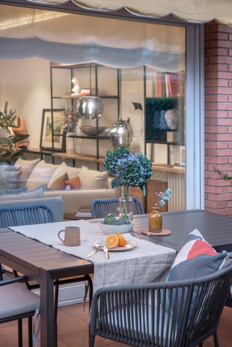 A Glass Enclosed Kitchen Is A Noticeable Design Feature Of This Home ...