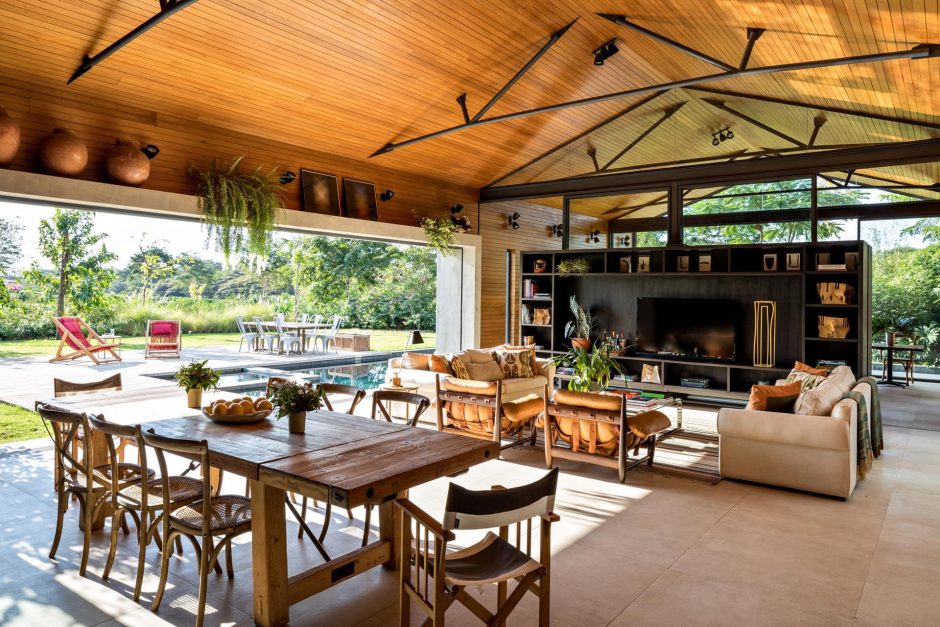 Two Living Areas Inside This Home Are Separated By A Double-Sided Room ...