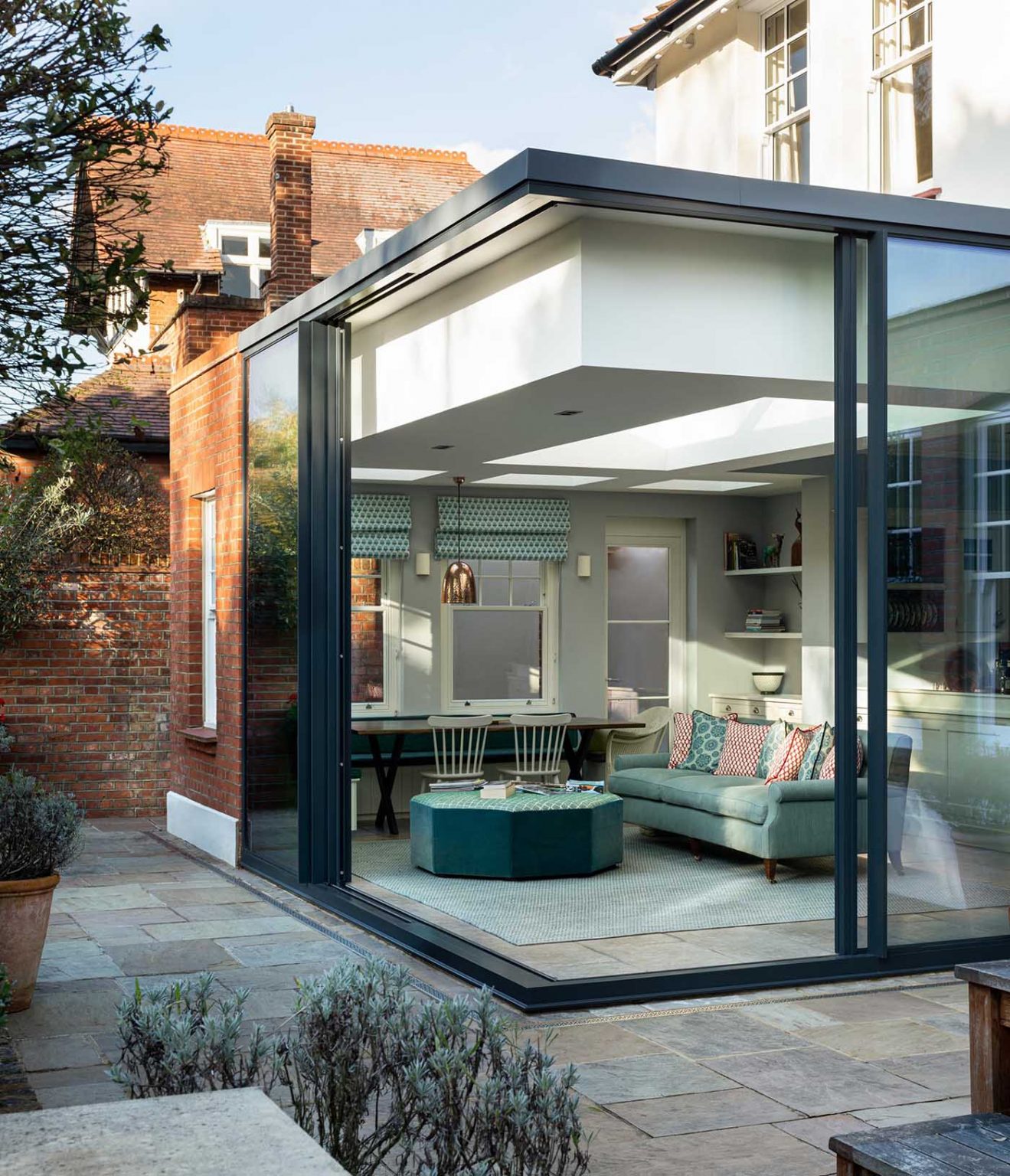 A Glass Enclosed Extension Adds A Light-Filled Living Space To This Home