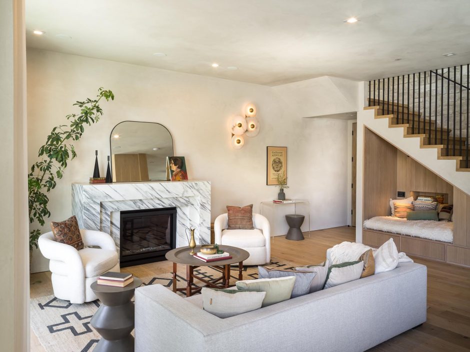 A Seating Nook Under The Stairs Offers A Quiet Place To Read In This Home
