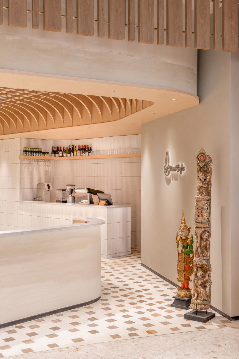 A Grid-Shaped Wood Ceiling Covers This Cafe In China