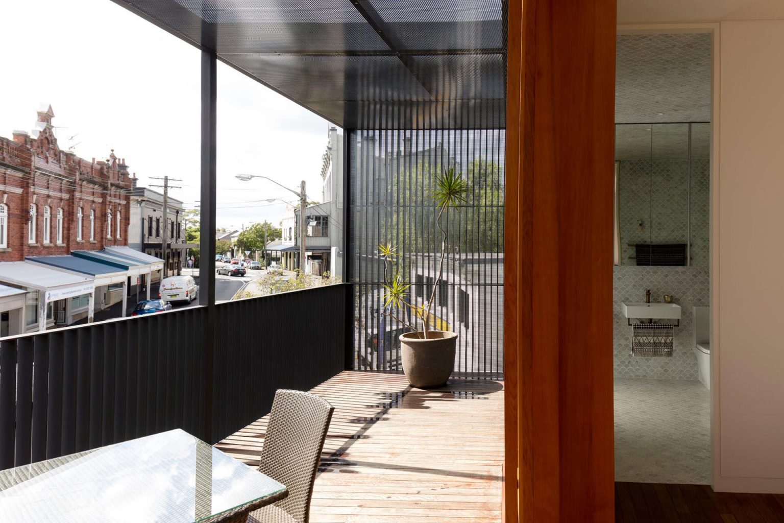 Glazed Black Tiles Present A Sophisticated Exterior For This Home That ...