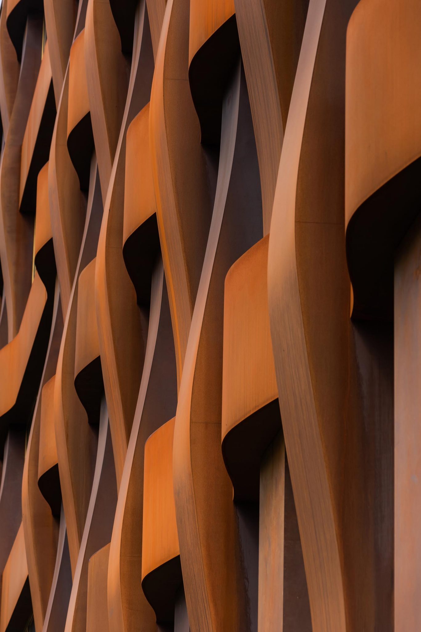 Weathered Steel Appears To Be Woven On The Exterior Of This New Office ...