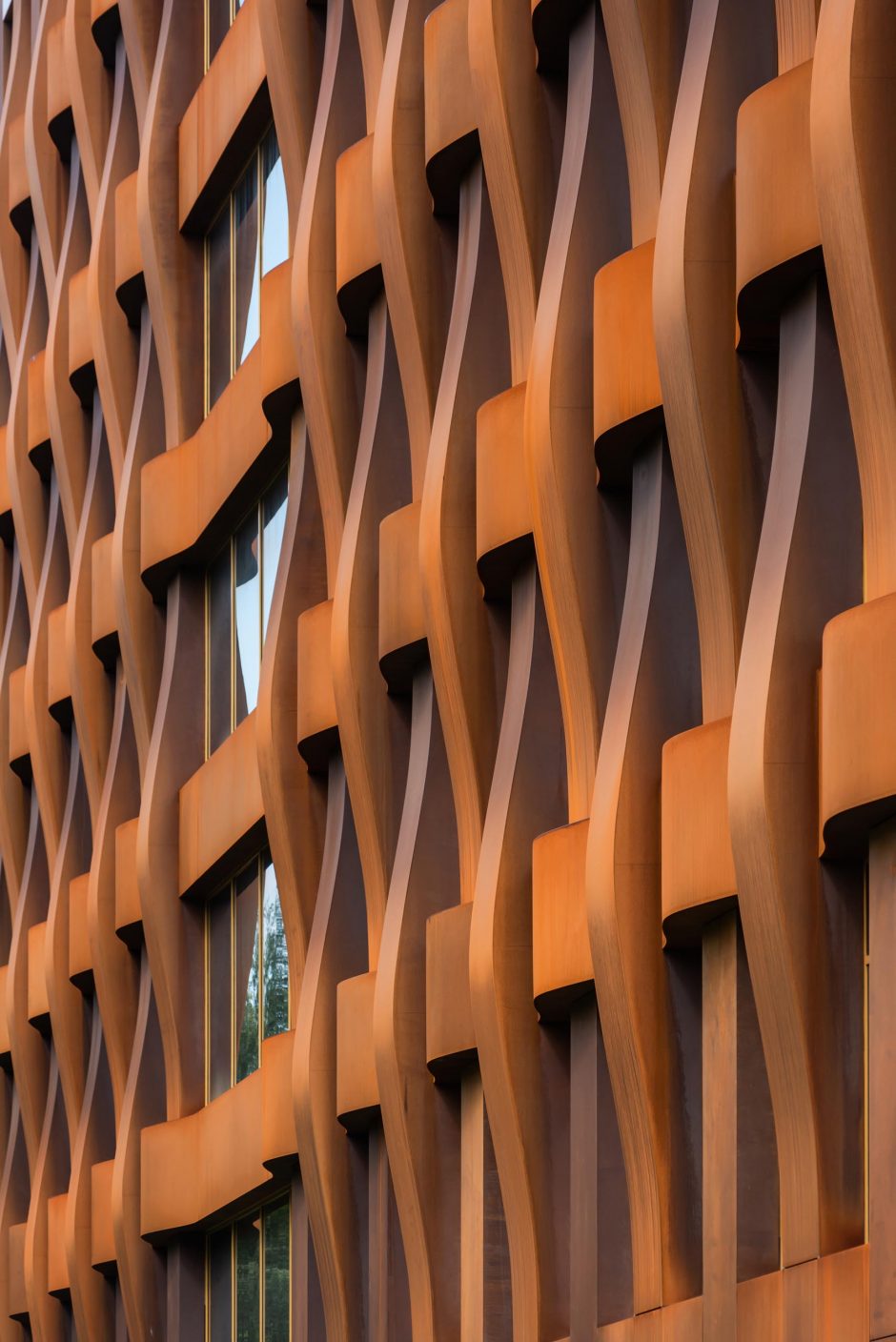 Weathered Steel Appears To Be Woven On The Exterior Of This New Office ...