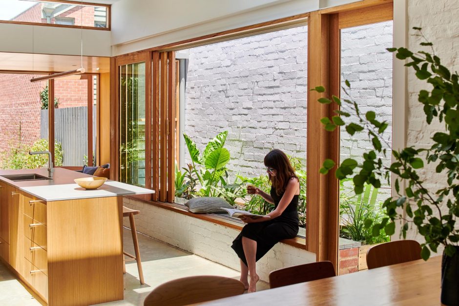 A Large Window Opens This Kitchen To A Side Garden