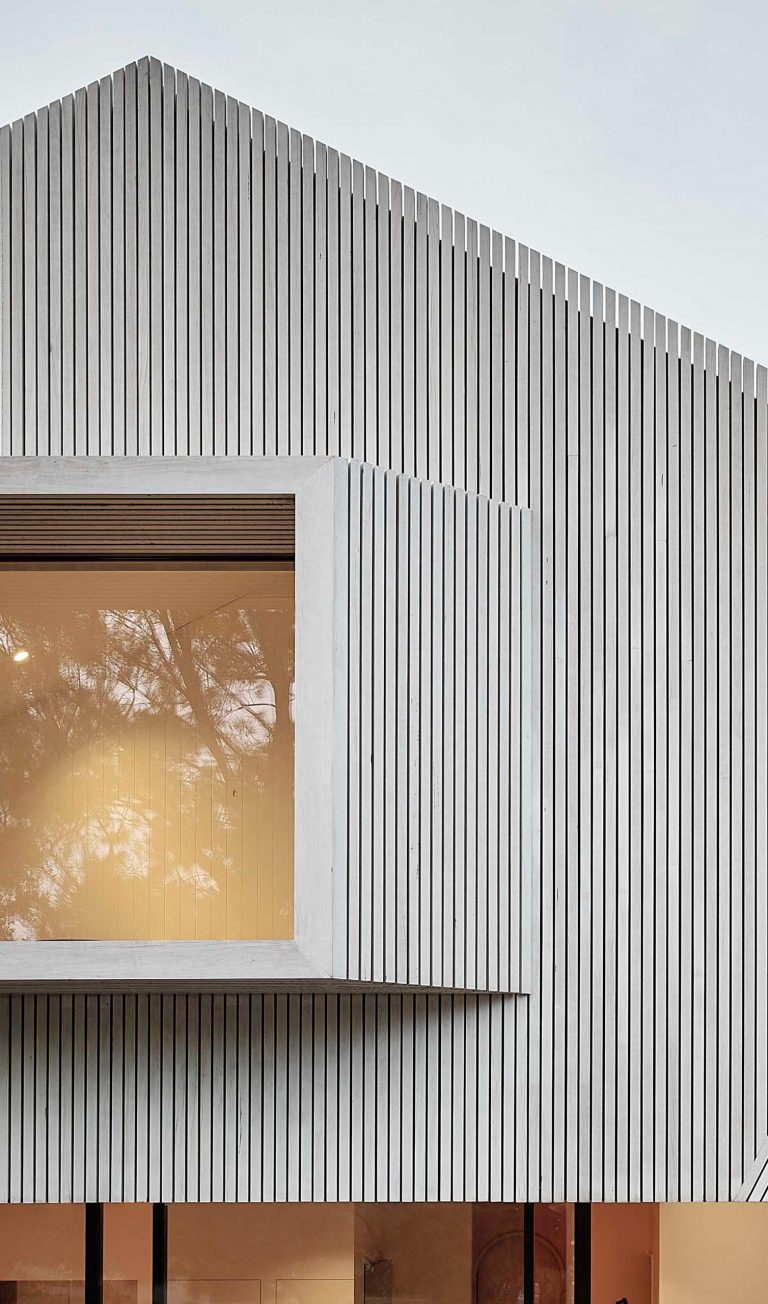 Angular Wooden Slats And A Projecting Window Create A Distinctive ...