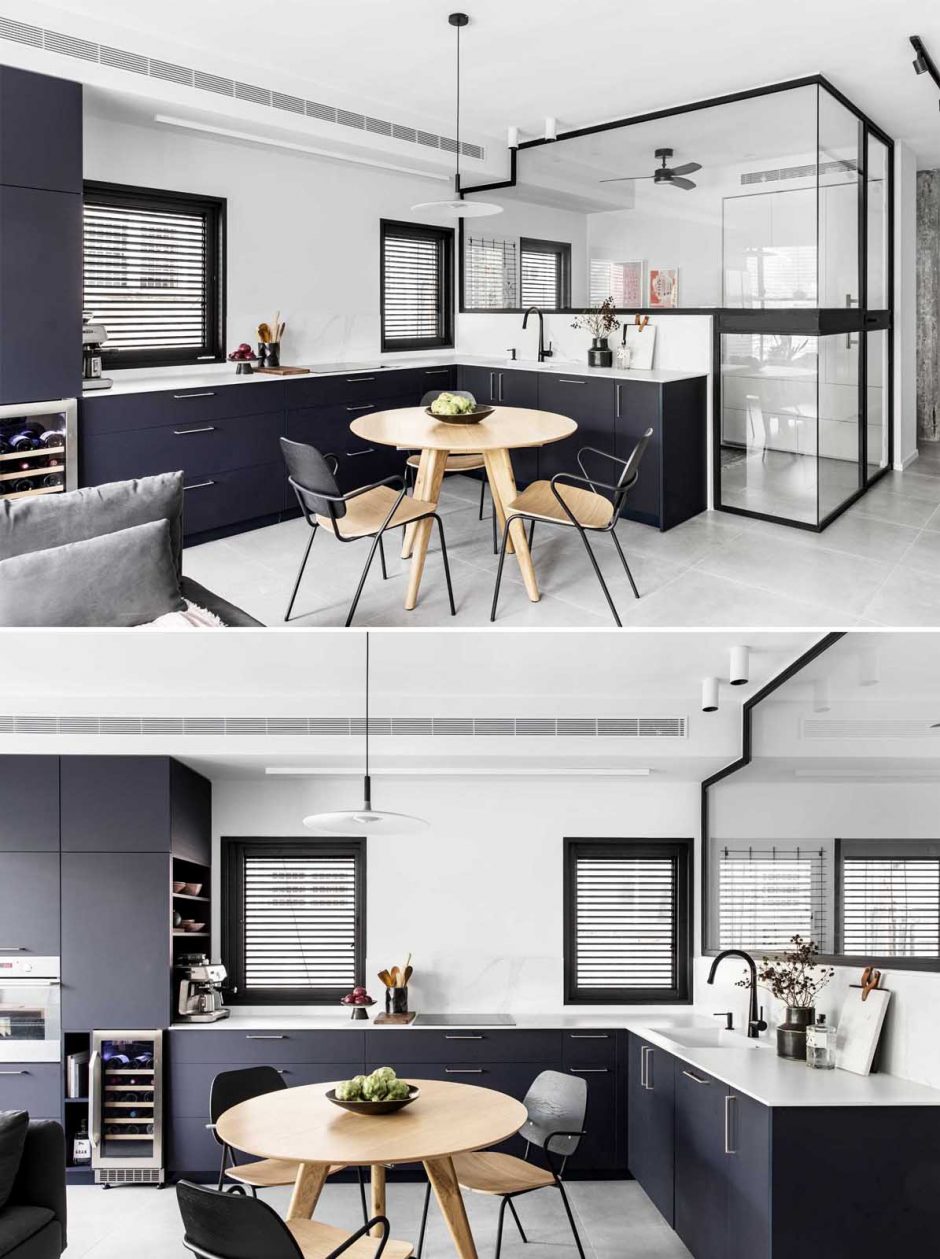 A Glass Enclosed Home Office Allows Light And Views To Pass Through ...
