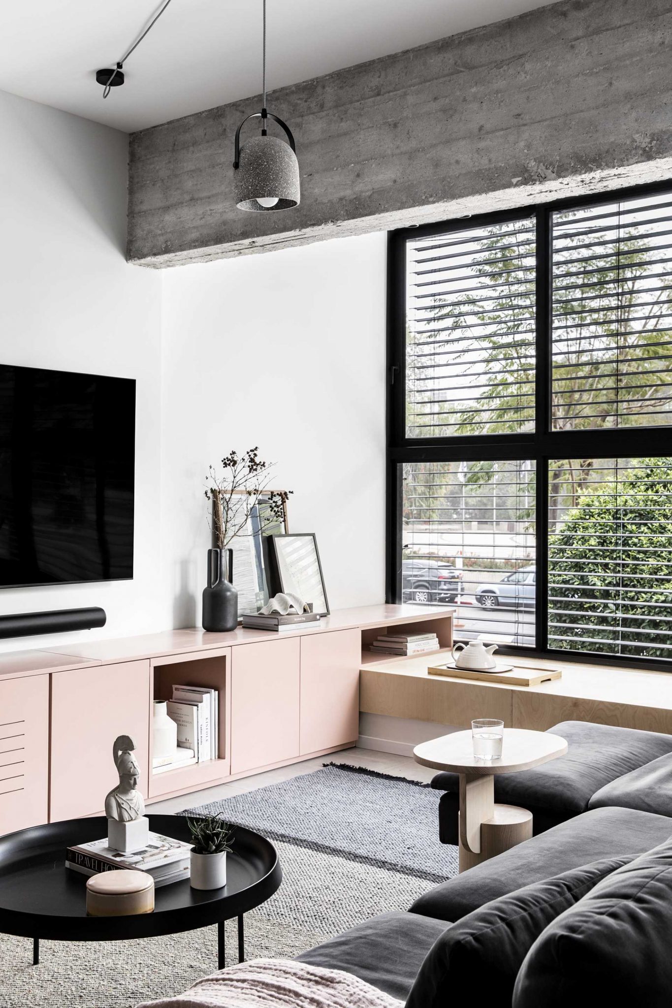 A Glass Enclosed Home Office Allows Light And Views To Pass Through ...