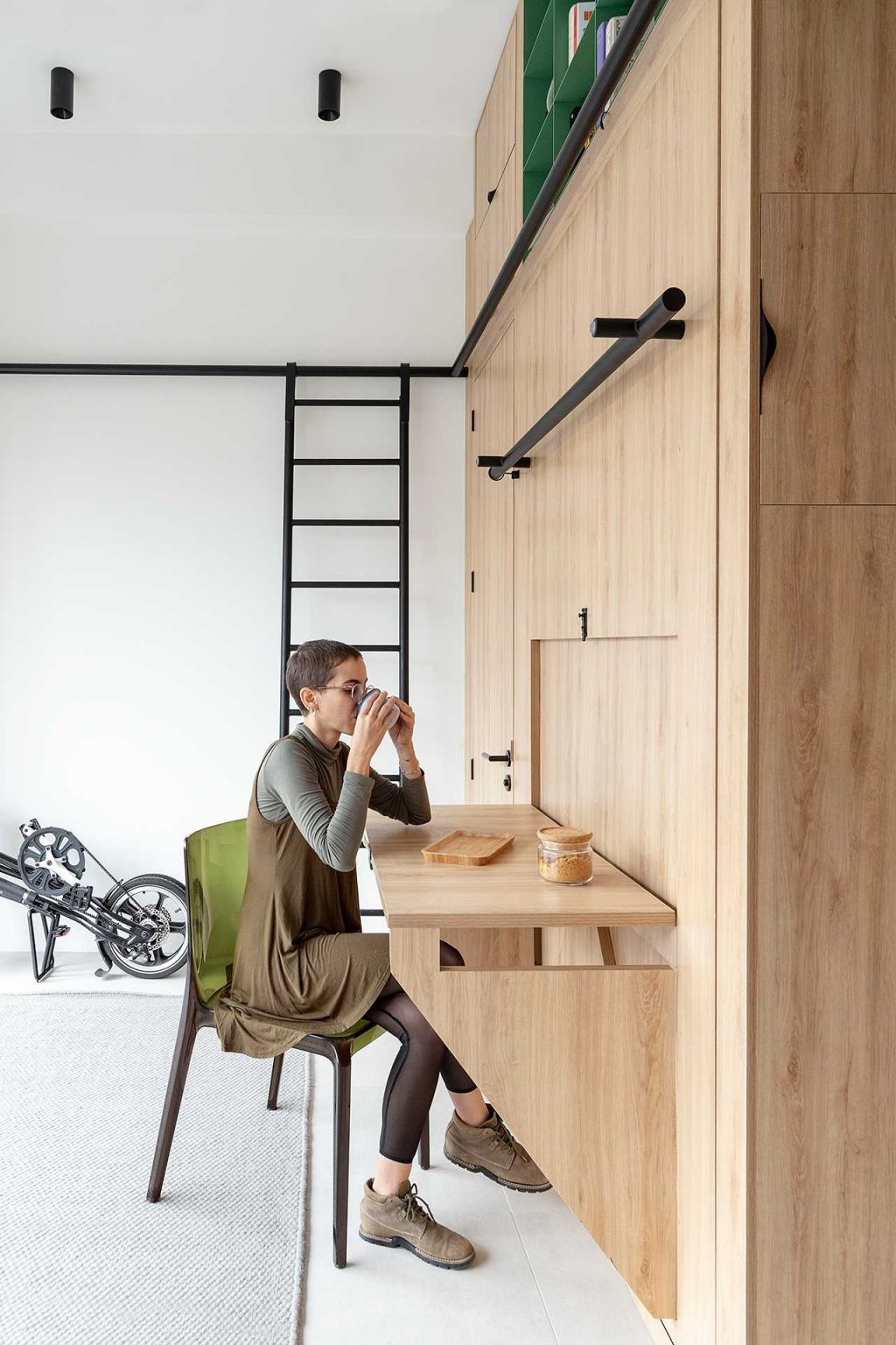 Custom Cabinet Design Makes The Most Of This Small Apartment Space