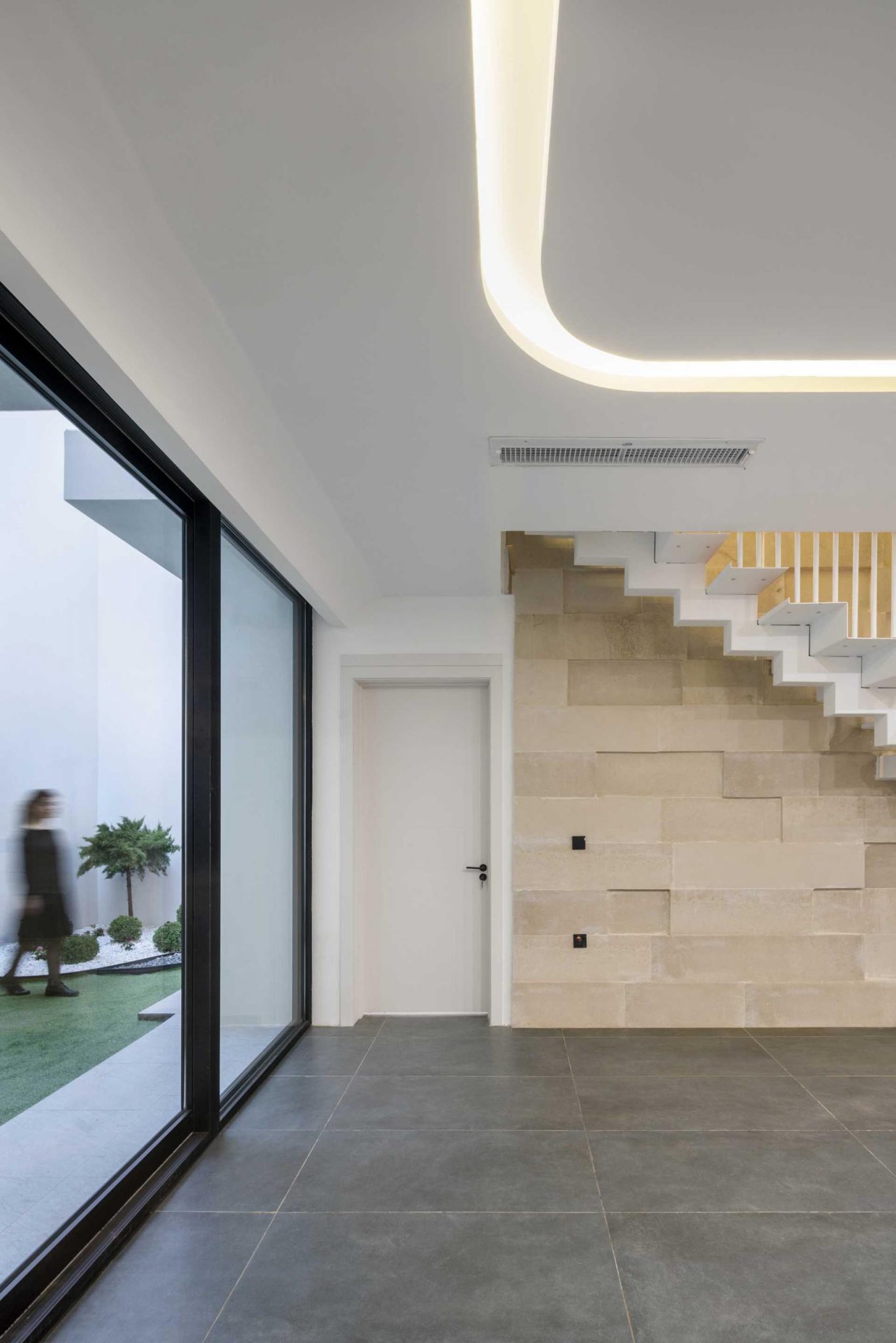 The Vertical Lines Of This Home's Exterior Siding Contribute To Its ...