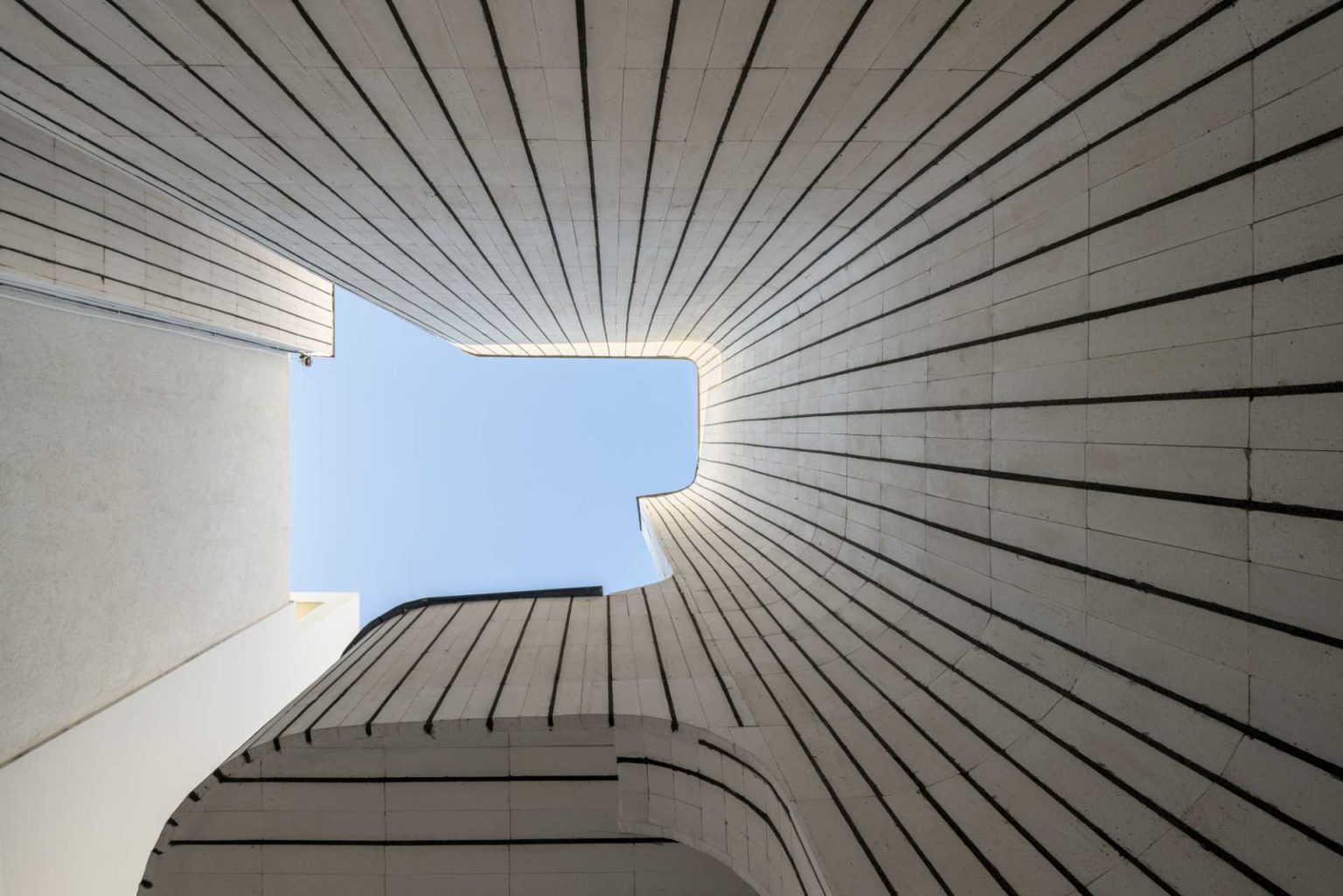 The Vertical Lines Of This Home's Exterior Siding Contribute To Its ...