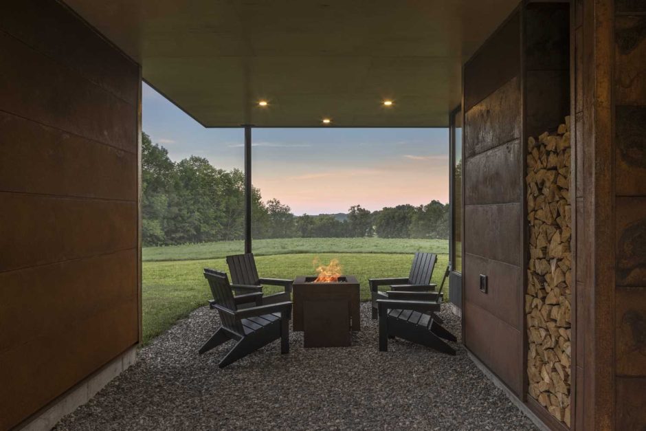 Rusty Weathered Steel Siding Covers This Small Home In Rural New York