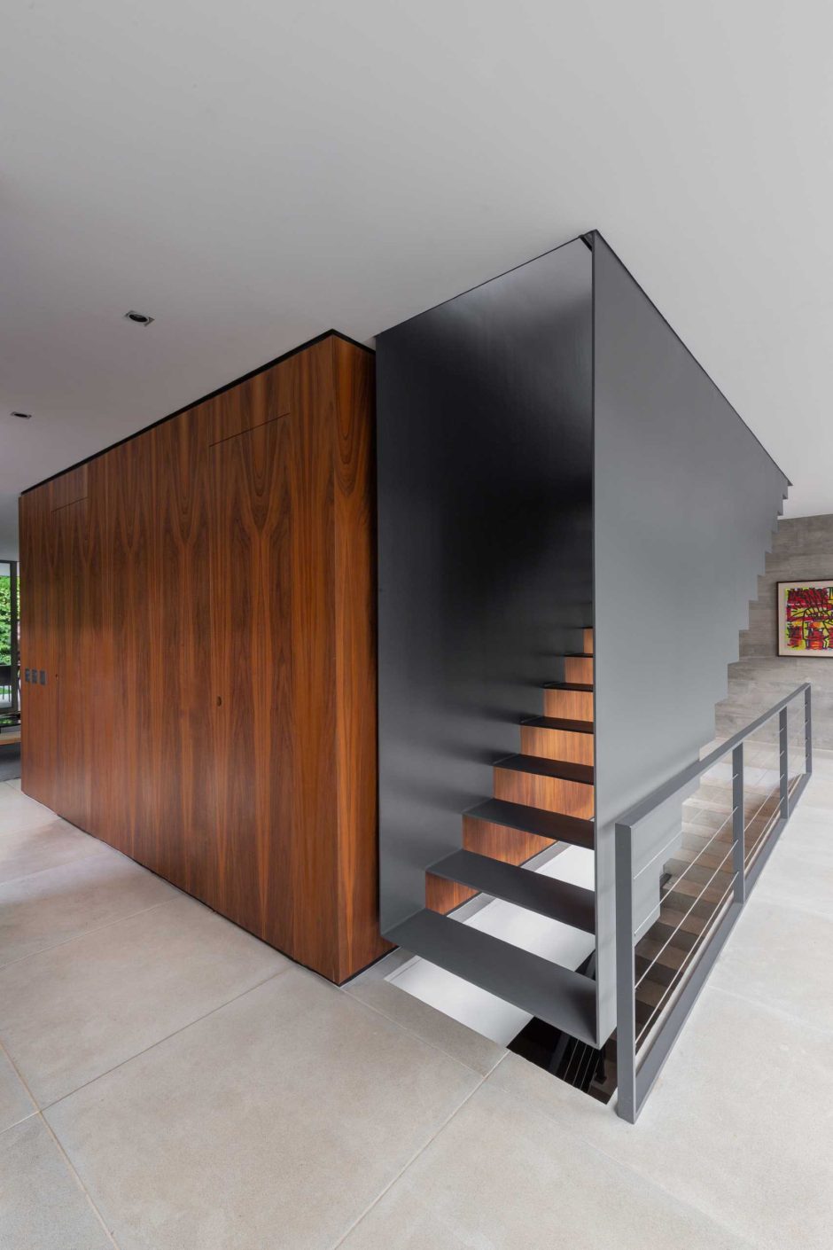 Oversized Metal Shutters Provide Privacy And Shade For This Modern Home