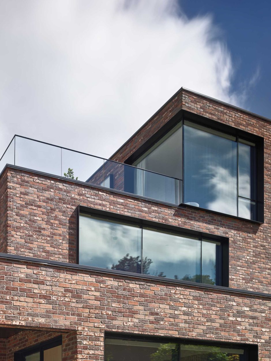This Modern Brick House Terraces Down The Hillside