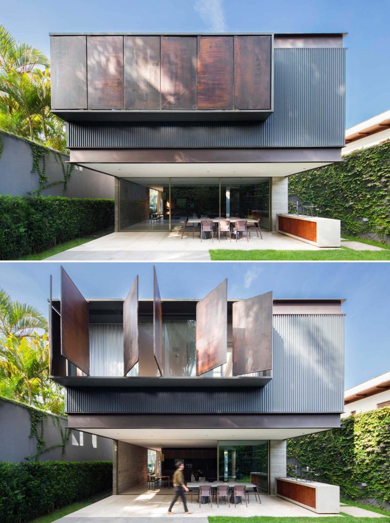 Oversized Metal Shutters Provide Privacy And Shade For This Modern Home