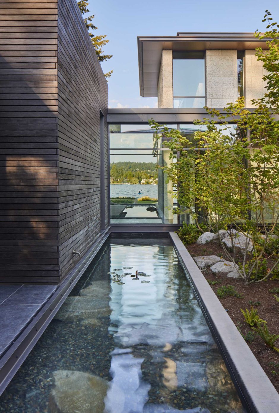 Water Flows All Around This Lakeside Home