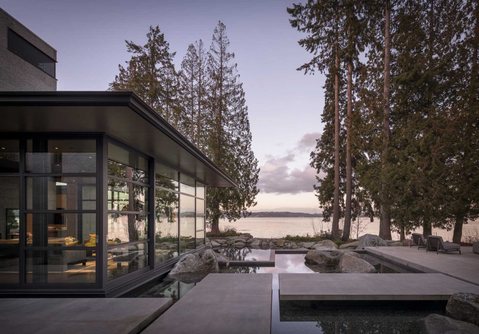 Water Flows All Around This Lakeside Home