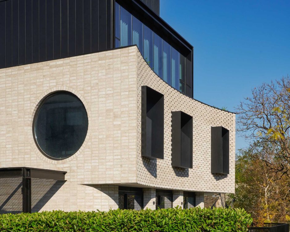 A Curved Brick Facade Presents A Contemporary Face For This Collection ... A Curved Brick Facade Presents A Contemporary Face For This Collection ...