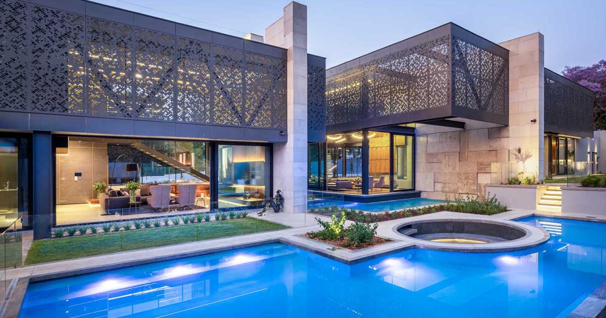 Folding Aluminium Screens Are Used For Privacy And Sun Control On This Home