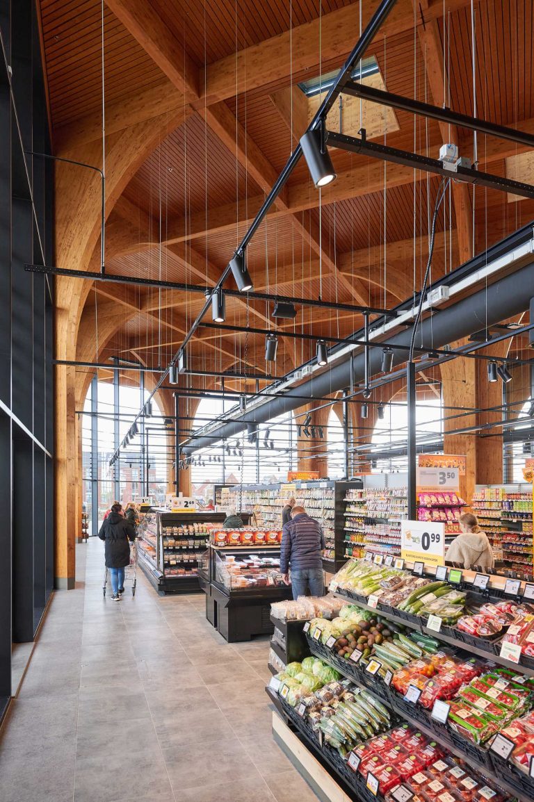 Elegant Cathedral-Like Wood Columns Support A Canopy Over This New ...