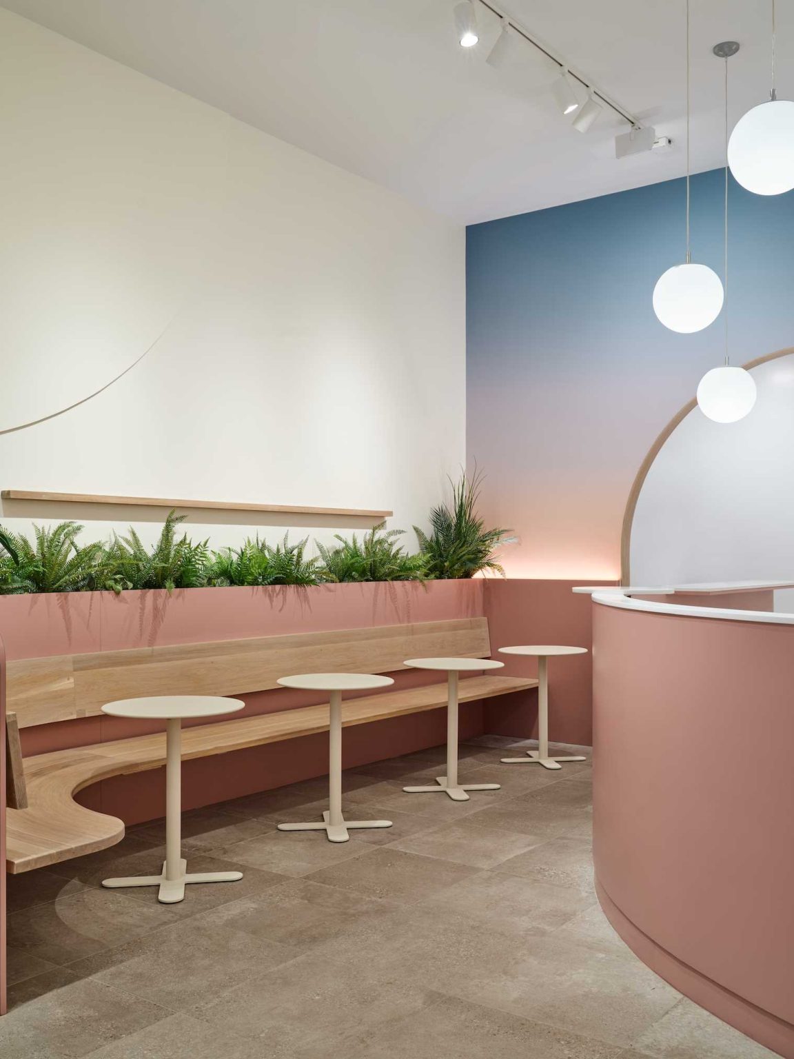 Soft Colors Were Used To Design A Relaxed Atmosphere For This Cafe