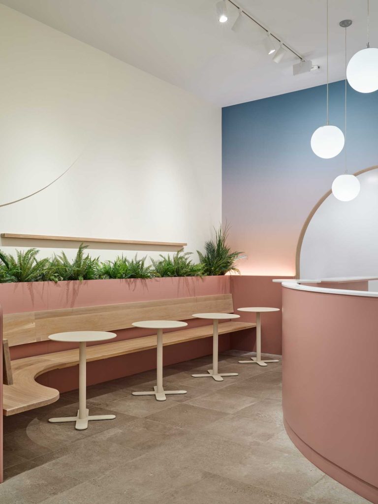 Soft Colors Were Used To Design A Relaxed Atmosphere For This Cafe