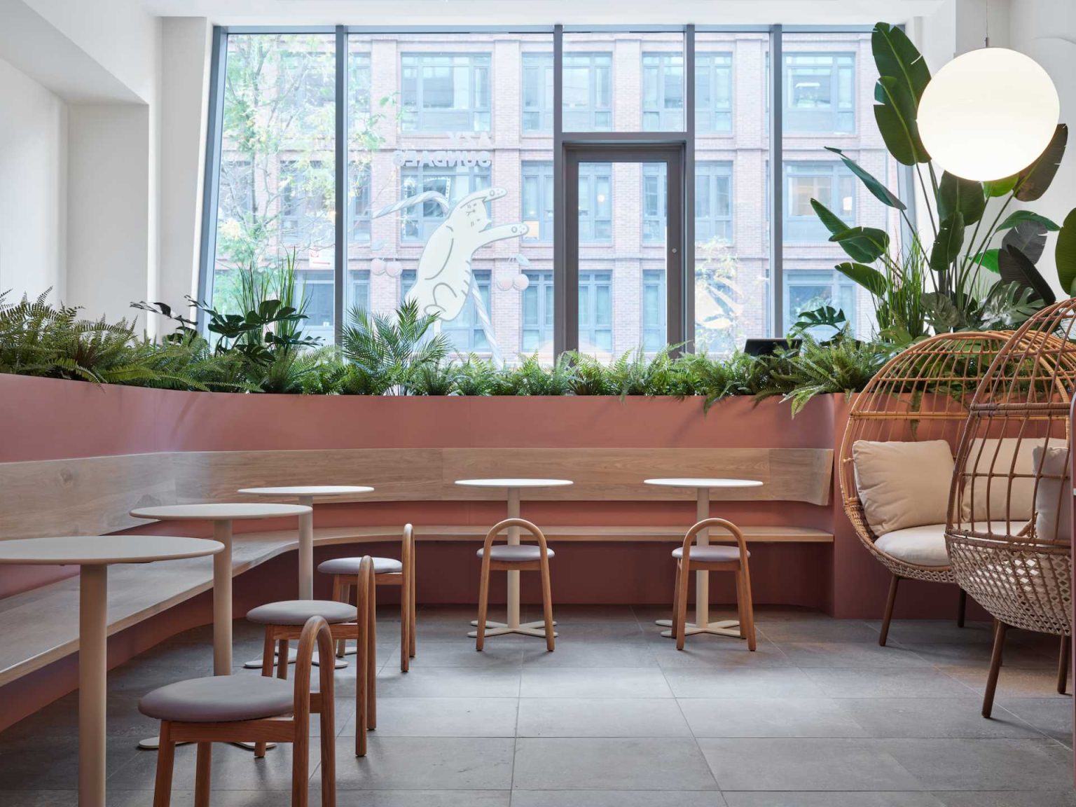 Soft Colors Were Used To Design A Relaxed Atmosphere For This Cafe
