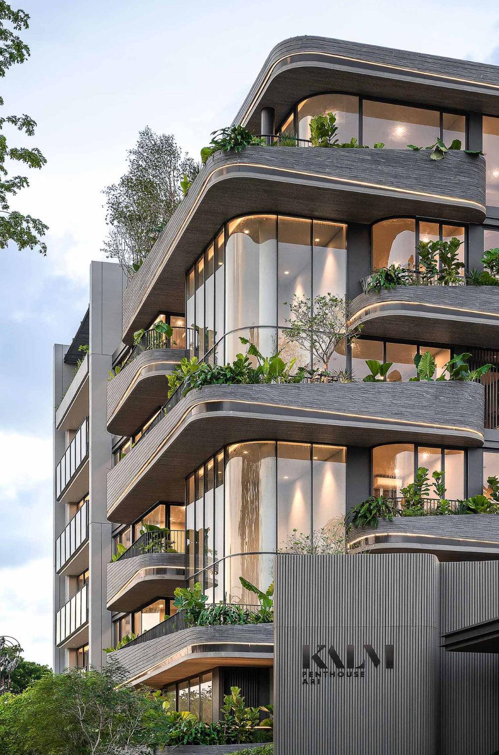 Lighting Is Used To Highlight The Rounded Balconies Of This Building ...