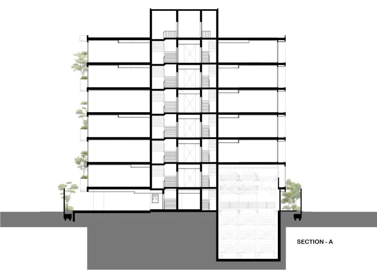 Lighting Is Used To Highlight The Rounded Balconies Of This Building