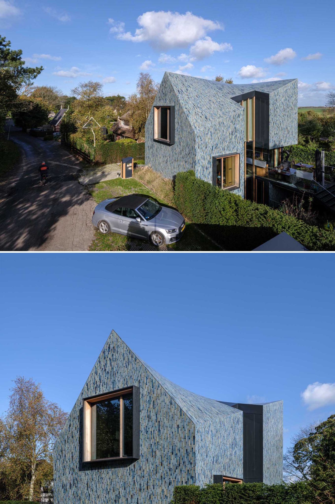 Blue Tiles Cover The Exterior Of This House With A Twisted Roof