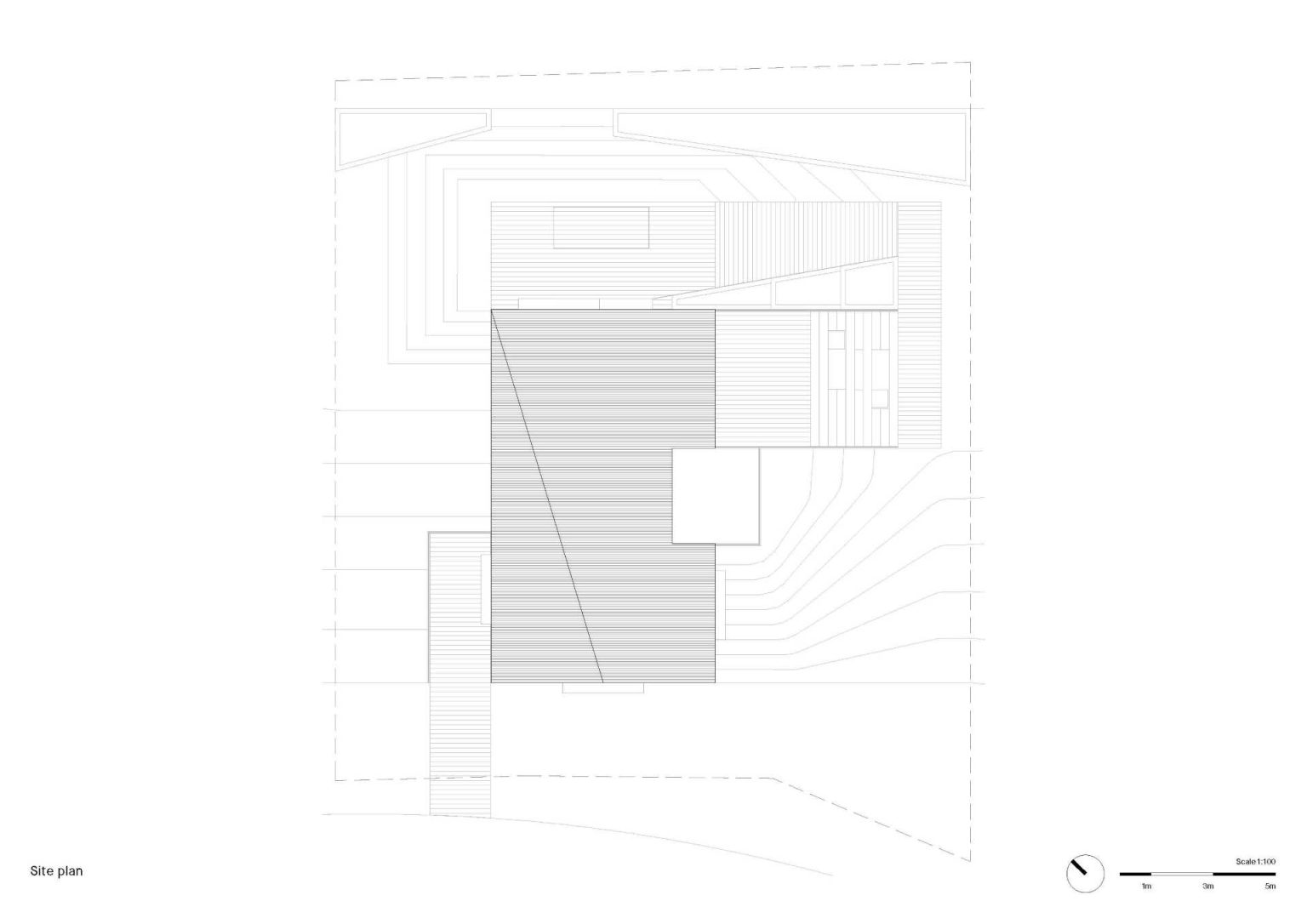 Blue Tiles Cover The Exterior Of This House With A Twisted Roof